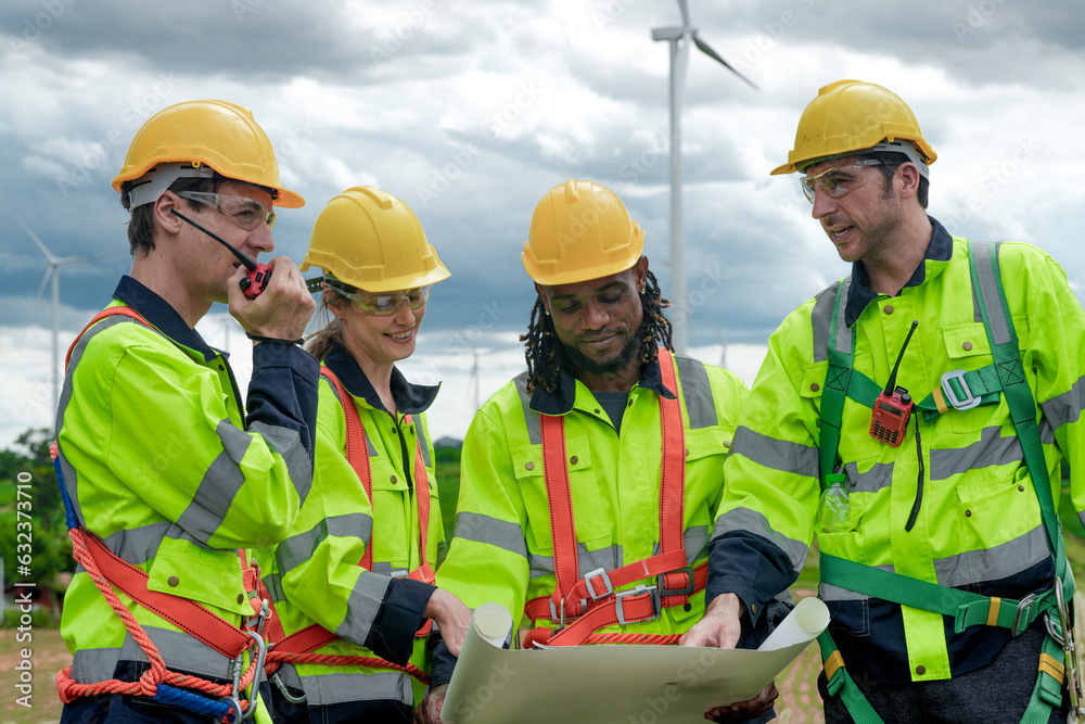 Smart professional engineers working in fieldwork outdoor. Workers ...