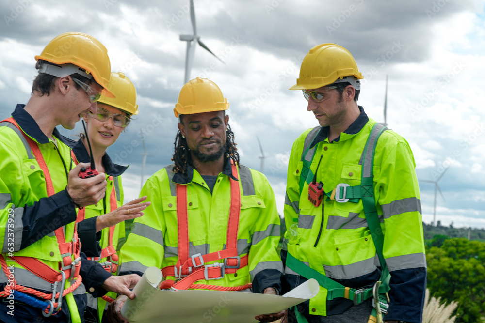 Smart professional engineers working in fieldwork outdoor. Workers ...