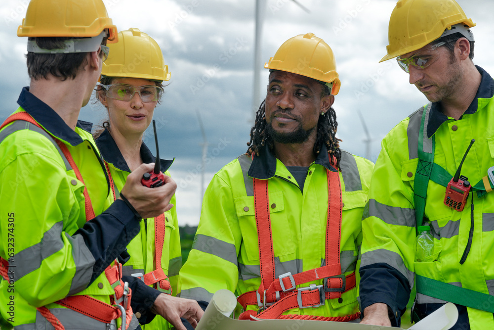 Smart professional engineers working in fieldwork outdoor. Workers ...