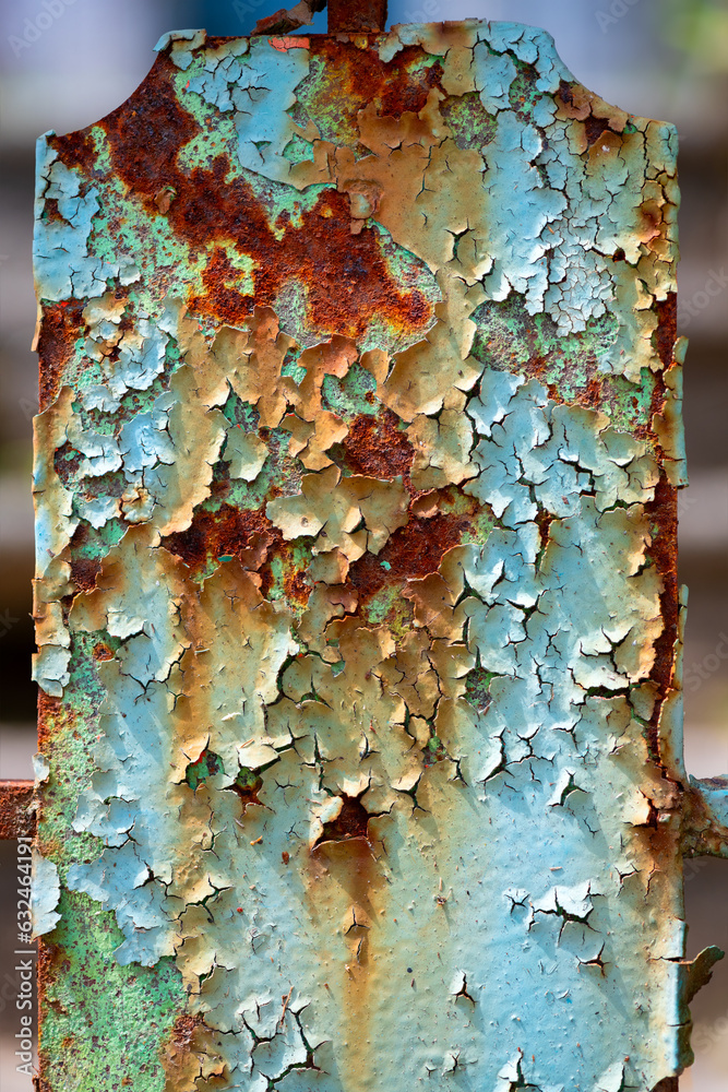 Peeled off paint on rusty surface of a ruined door lock. Vintage metal ...