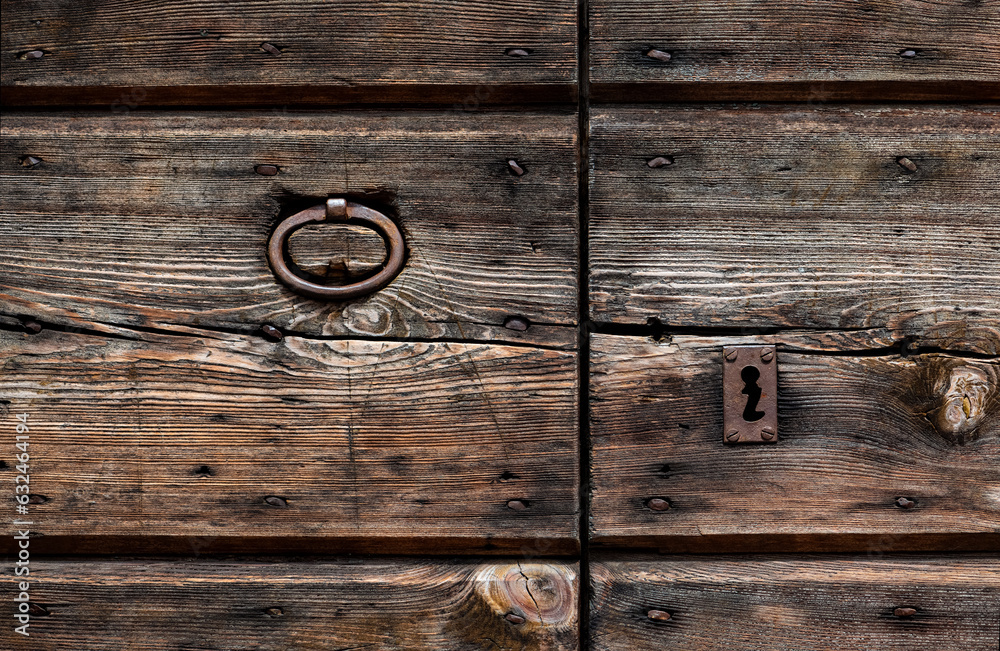 Rusty corroded metal door handle or grip and keyhole. Weathered old ...