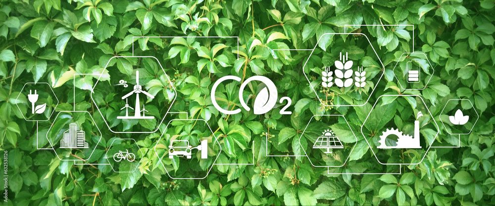 reducing CO2 emissions to stop climate change. green energy background ...