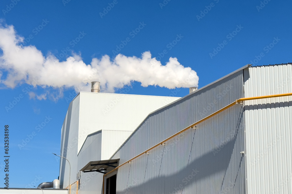 Smoke tower of industrial factory. Chimney smokestack emission.Refinery ...