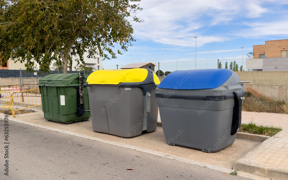 Dumpster for Garbage and food waste on city Spain street. Plastic bags ...