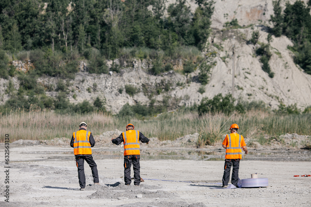 carrying out work in a quarry where minerals are extracted with the ...