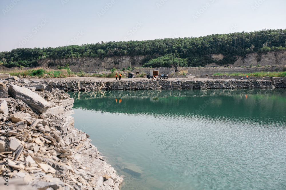 carrying out work in a quarry where minerals are extracted with the ...