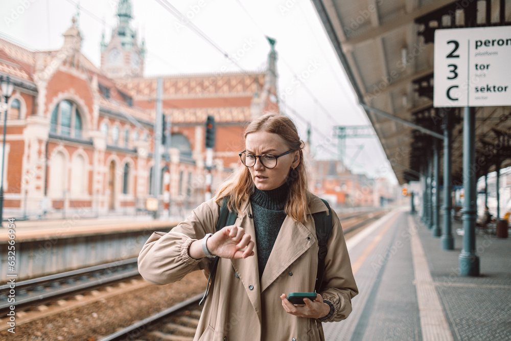 Train station in the morning commute woman going to work while waiting ...