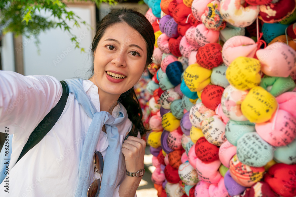 happy asian Japanese girl tourist looking at camera with smile while ...