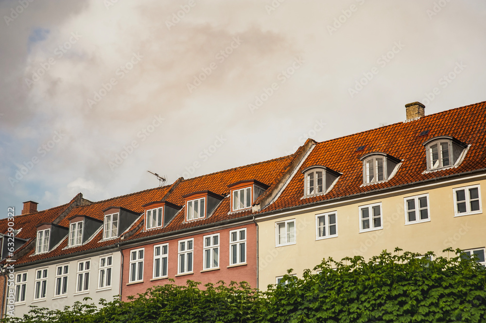 Danish neat architecture with 3 coloured buildings in a row, Copenhagen ...