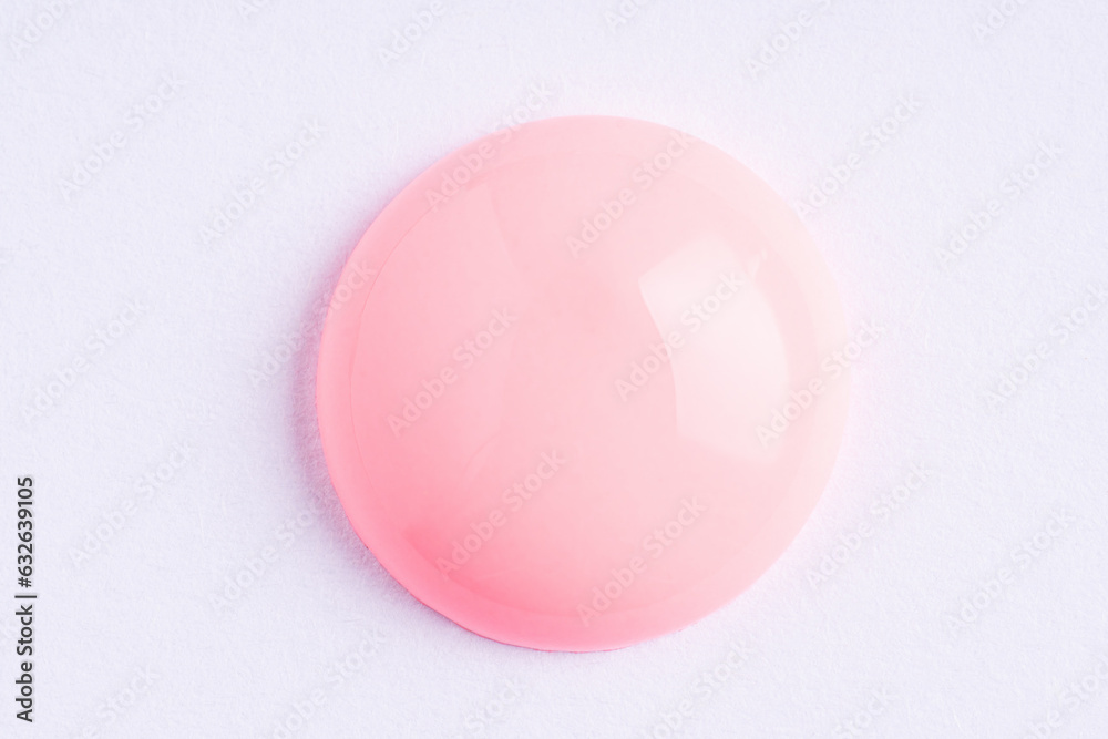 Light pink paint swatch on white paper background. Peach color swatch ...