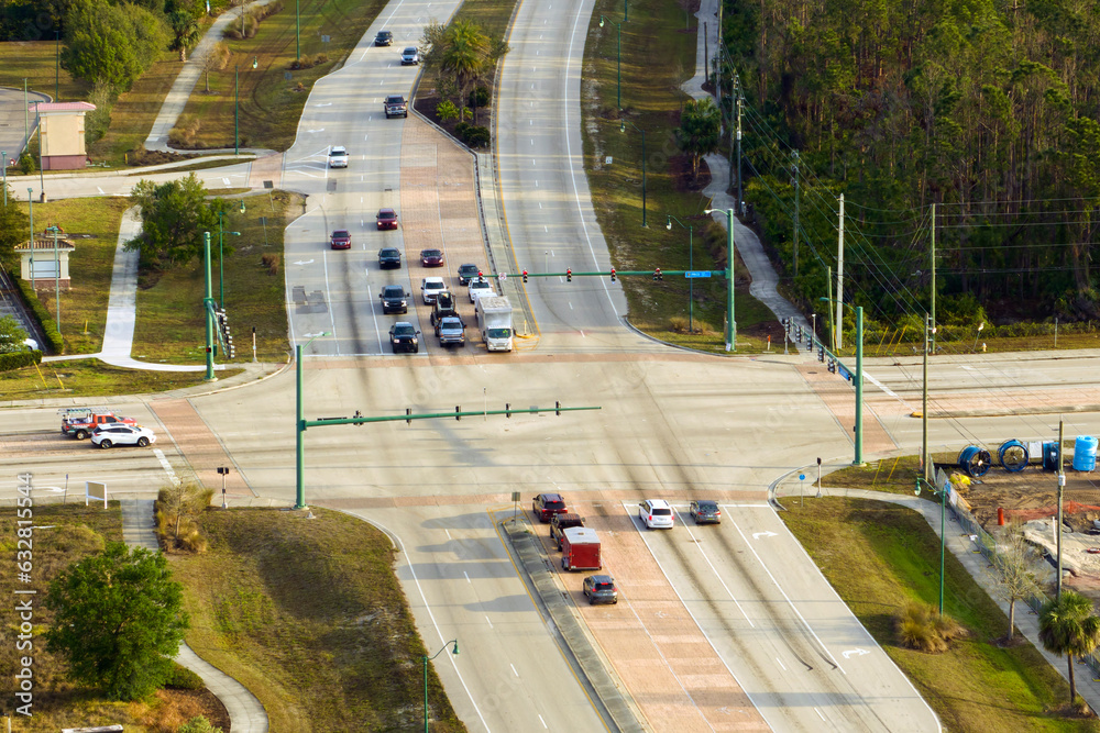 View from above of wide multilane road with driving vehicles at ...