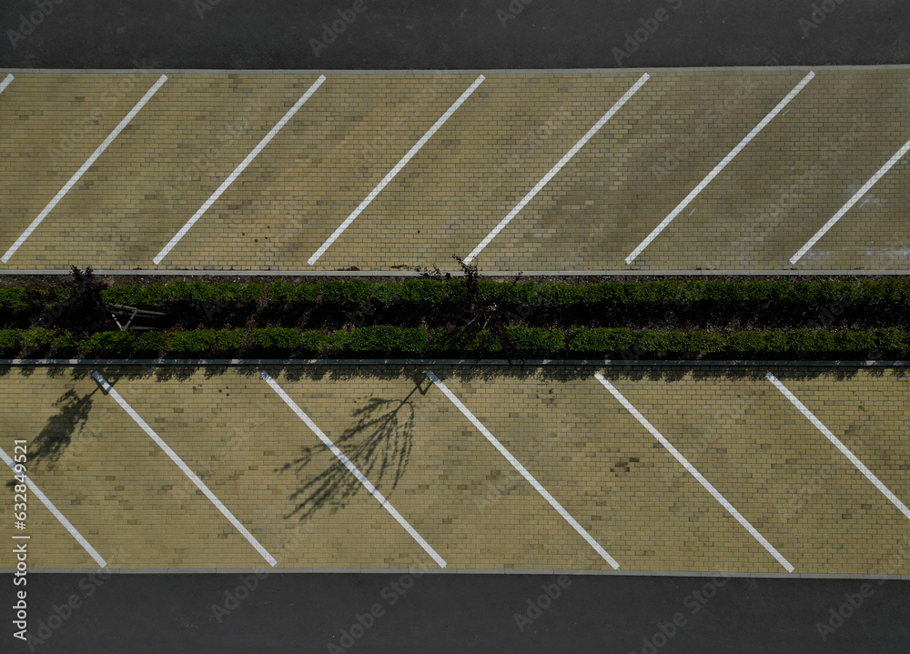 diagonal parking. drone view of shopping mall parking lot with alley in ...