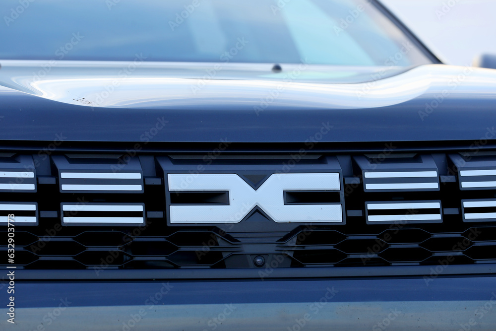 The new logo sign of Dacia company after rebranding, in front of a ...
