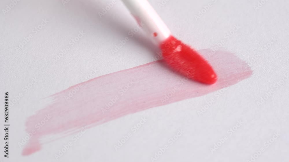 Cosmetic liquid lip gloss, lipstick smudge, smear, stroke. Smears of ...