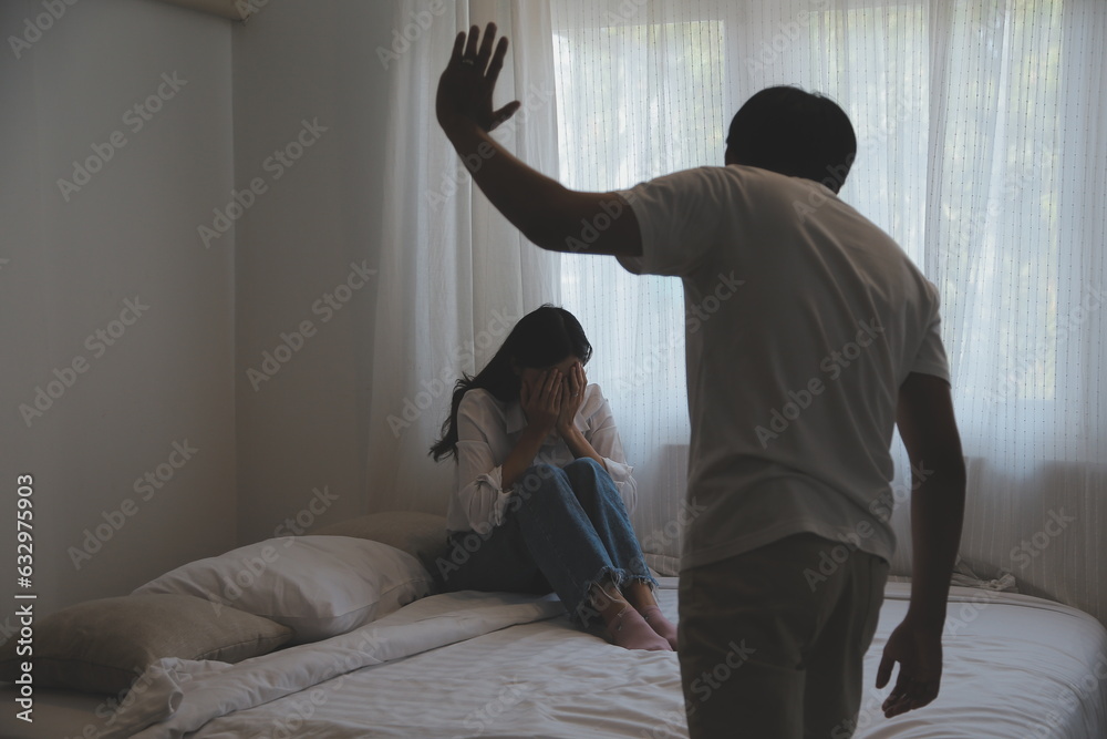 Upset woman having a fight with a man at home. Hispanic wife slapping ...