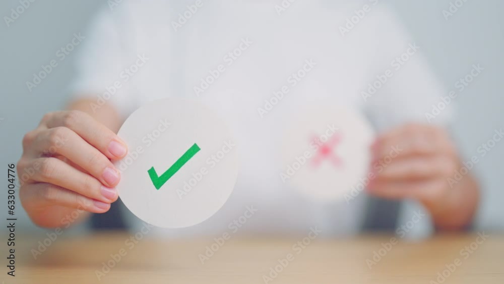 Woman show Right symbol paper. True and false, accept and rejected ...