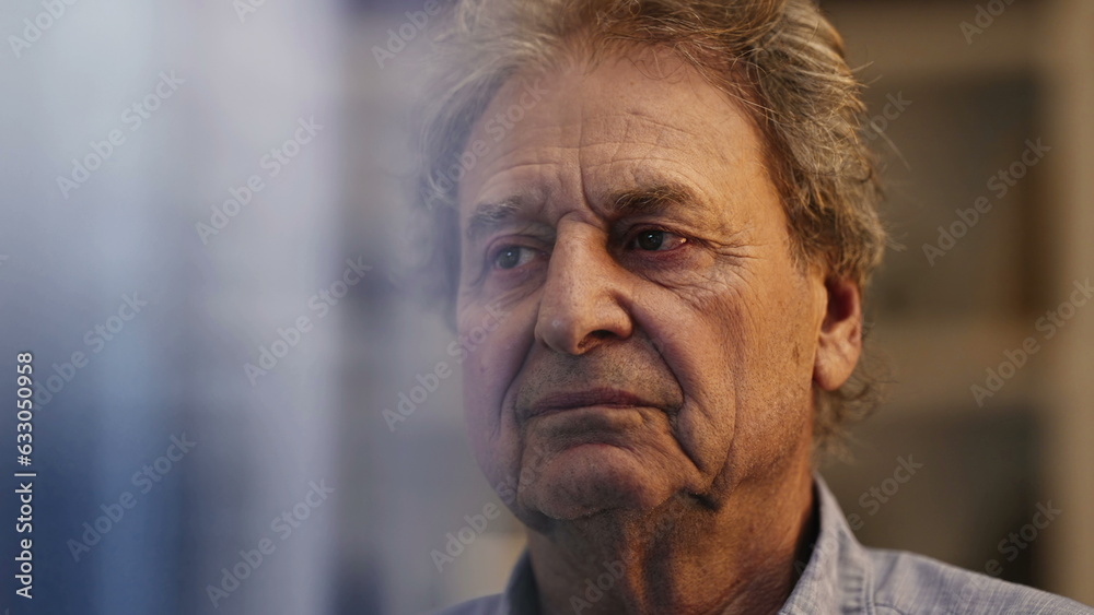 One serious contemplative senior man thinking about life seen through ...