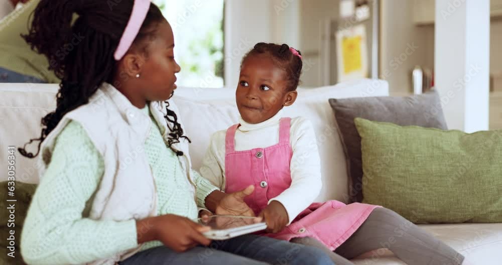 Girl children on sofa, fighting with tablet and bullying with angry ...