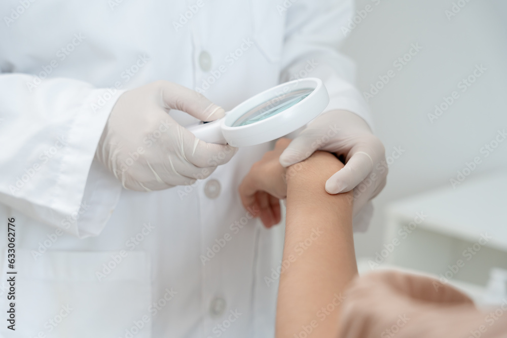 skin problem and beauty of asian girl. Dermatologist use magnifying ...