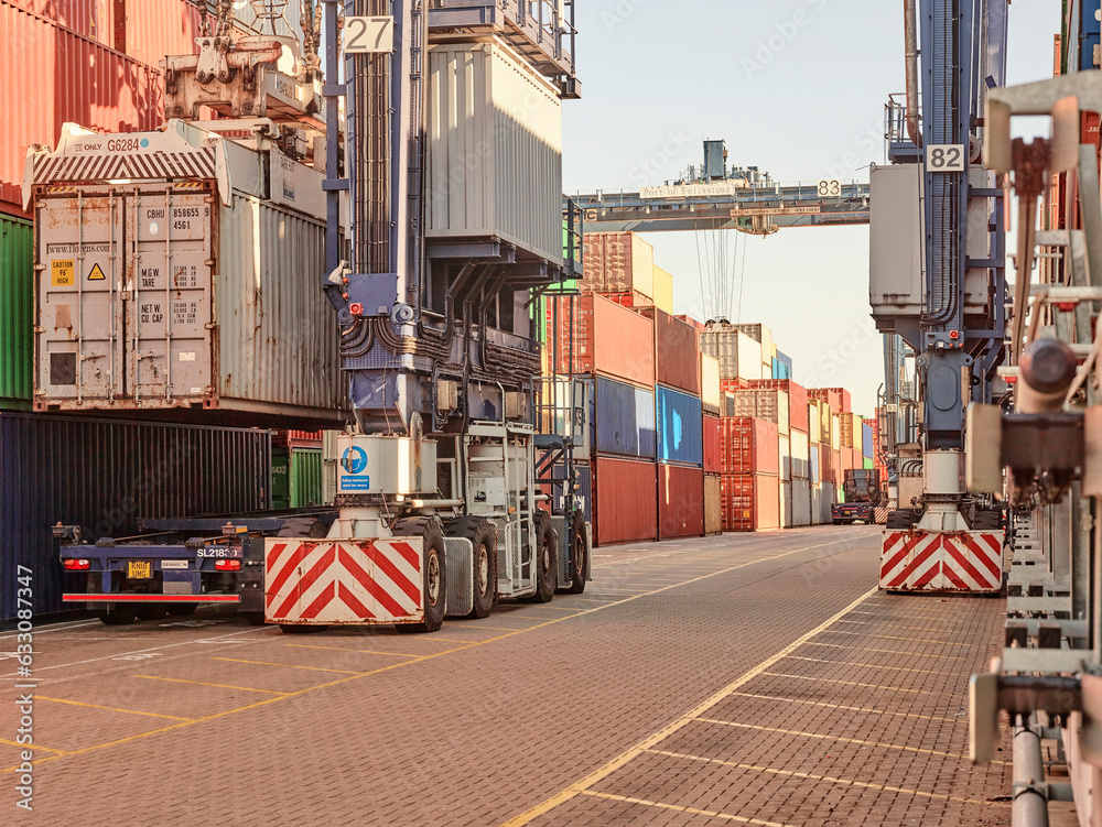 Shipping container being lifted by crane in dockyard, Felixstowe ...