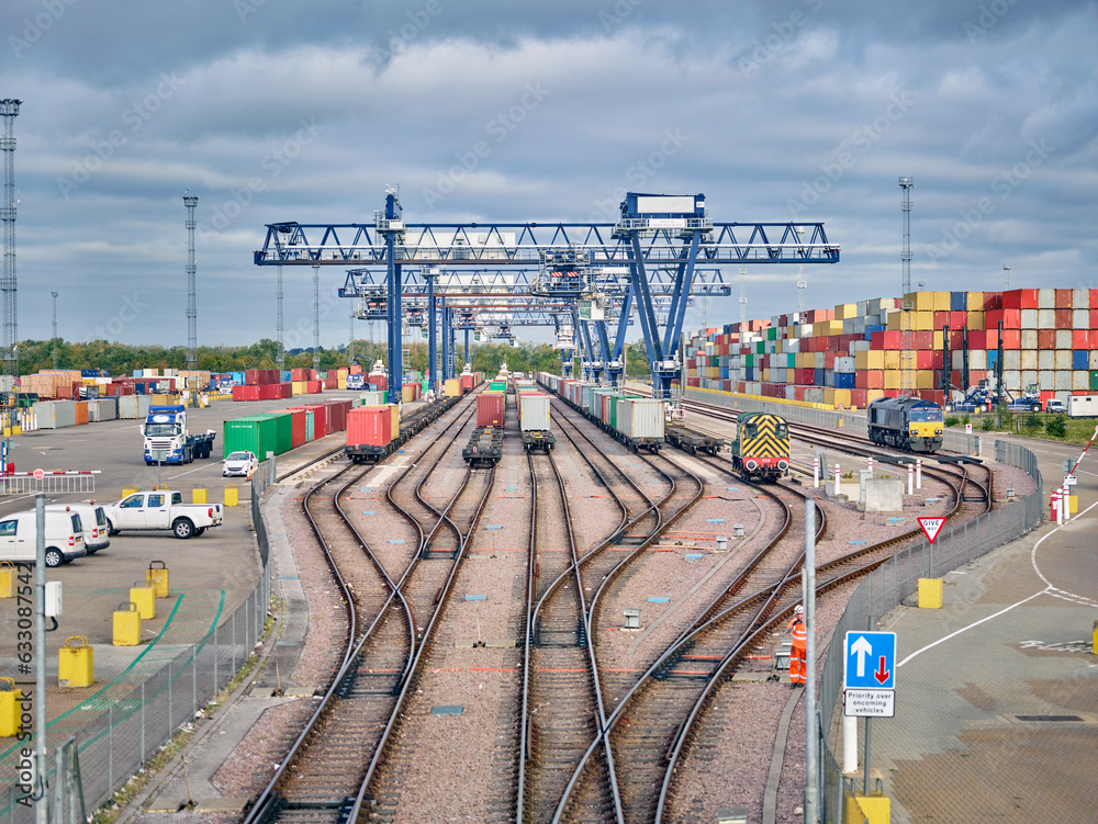 Dockyard railway tracks and cargo cranes, Felixstowe, England. Stock ...