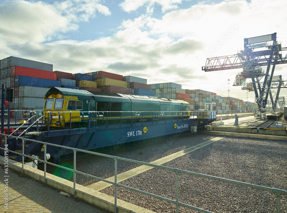 Train and shipping containers in docks, Felixstowe, England. Stock ...