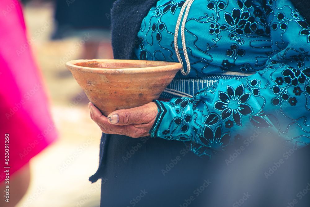 Traditional food in a clay plate used by the Saraguro indigenous ...