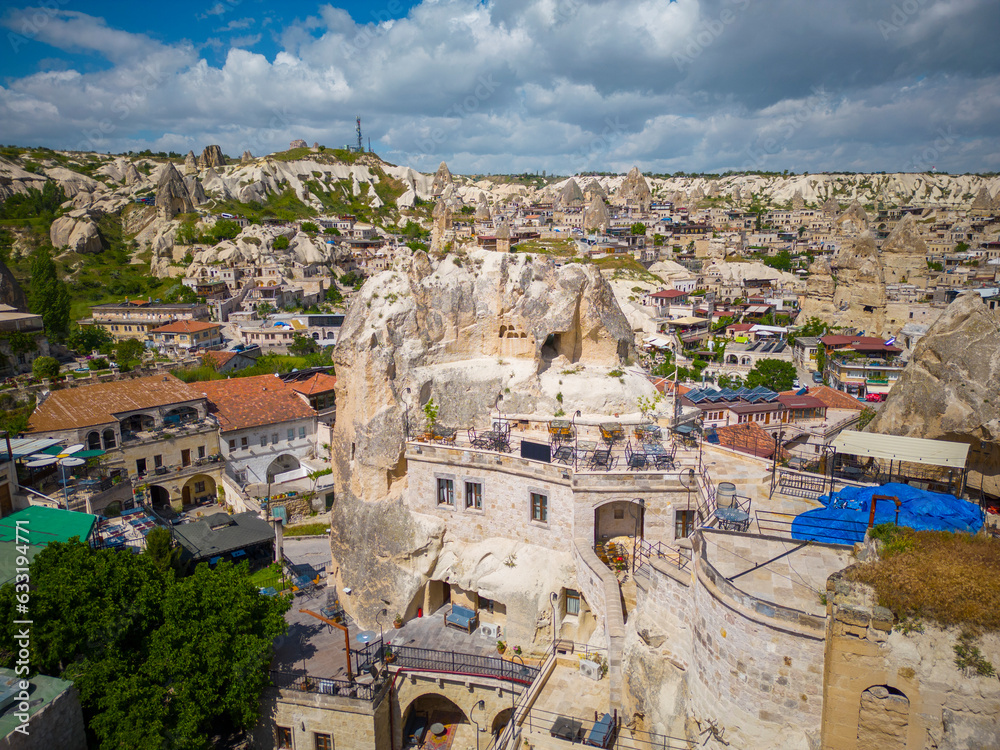Goreme Town Center historic building with fairy chimney landscape near ...
