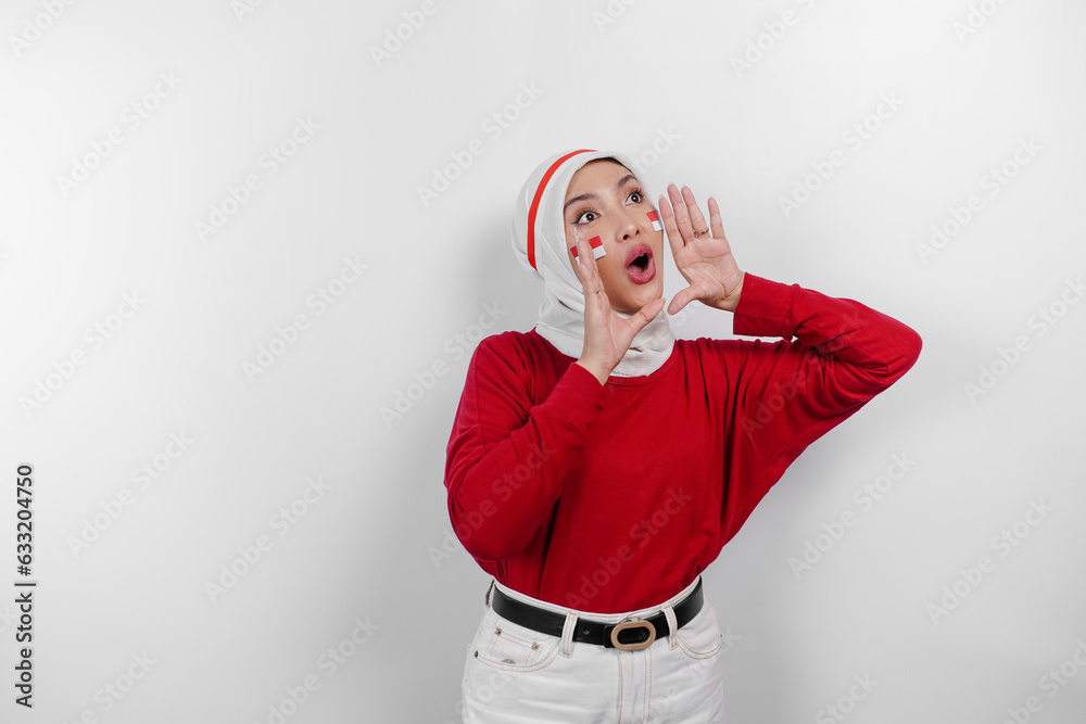 Young beautiful muslim woman wearing a red top and white hijab is ...