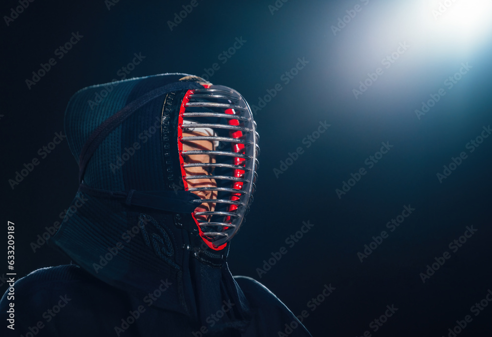Close-up Male in traditional kendo armor with Samurai sword katana on ...