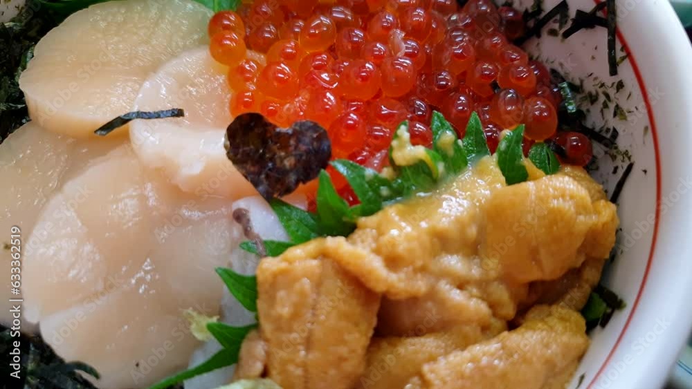 Hakkaido raw seafood rice topping scallop sea urchin and salmon roe ...