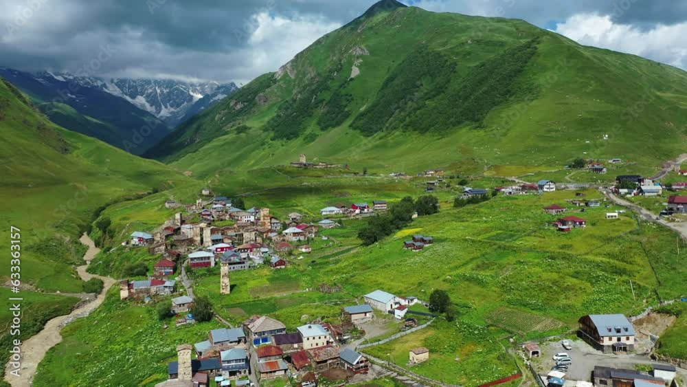 Ushguli village with buildings aerial view from drone. Located at head ...