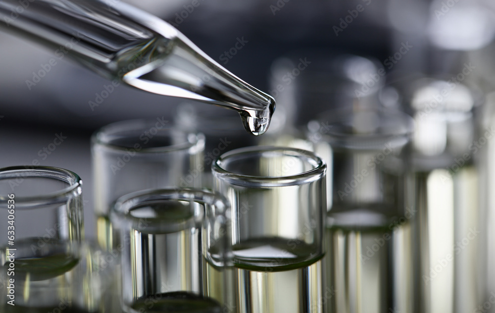 Yellow liquid spilled petrol additive innovative supply. Conveyor line ...