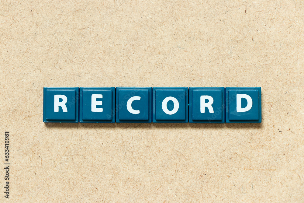 Tile alphabet letter in word record on wood background Stock Photo ...