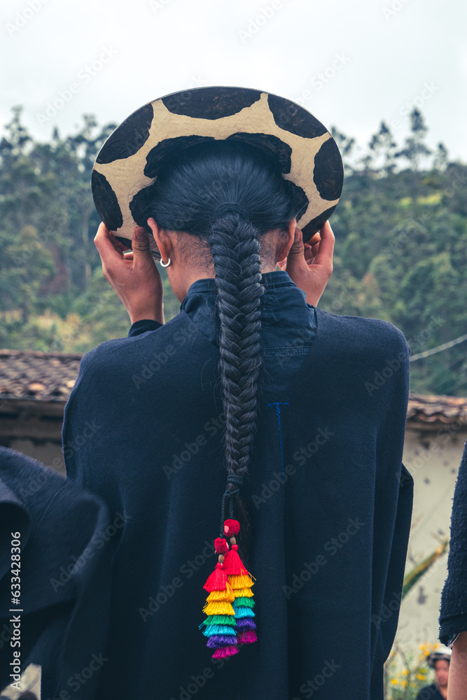 Long hair of the men of the Saraguro indigenous people, Ecuador as an ...