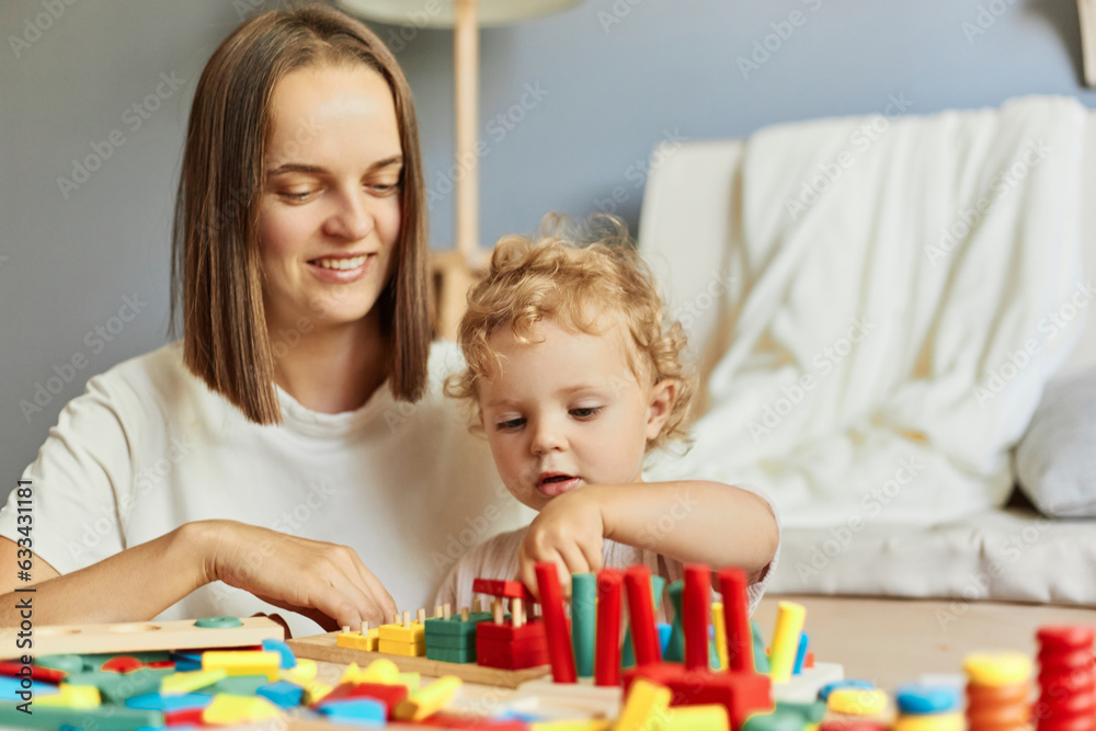 Playful toddler activities. Colorful kindergarten games. Wooden blocks ...
