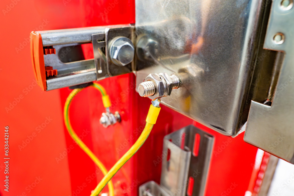 Electrical equipment. Wire is connected to production machine. Fragment ...