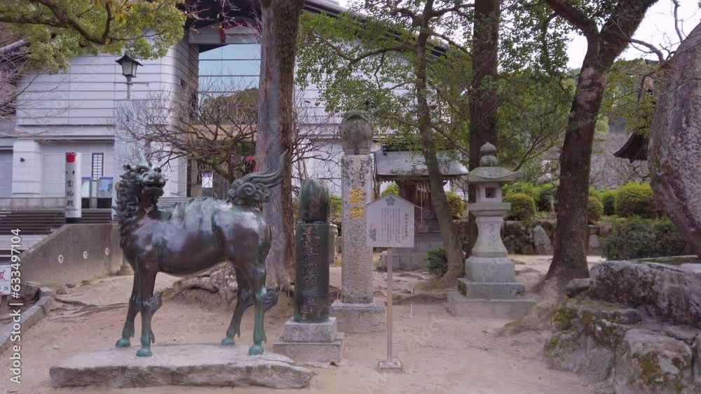 kyushu, japan - december 07 2022: Pan video of statues of Kirin or ...