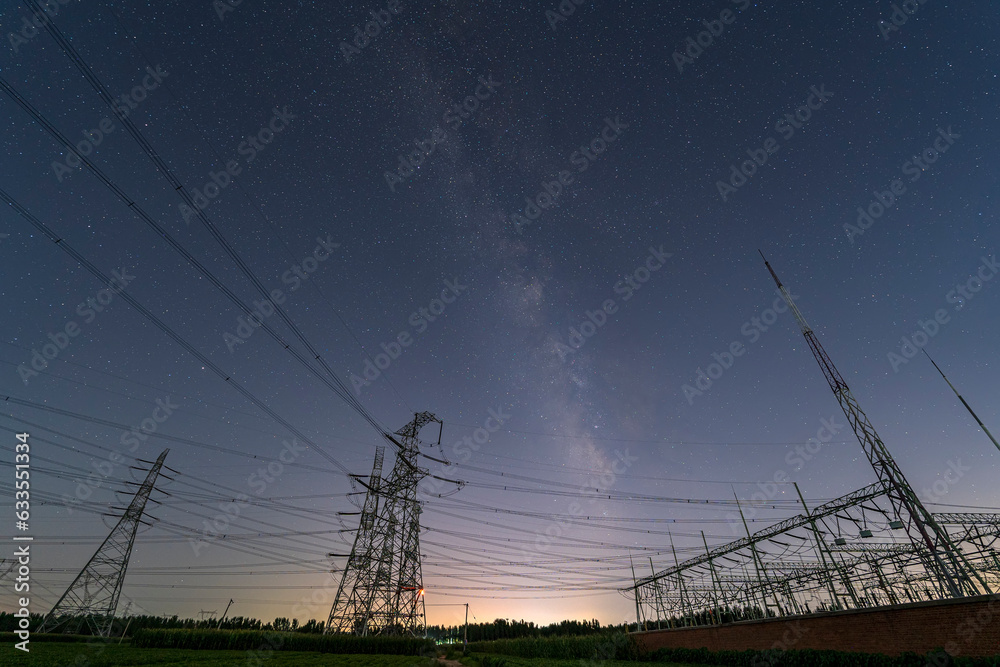 Poster pylon and the Milky Way, The high voltage substation is under ...