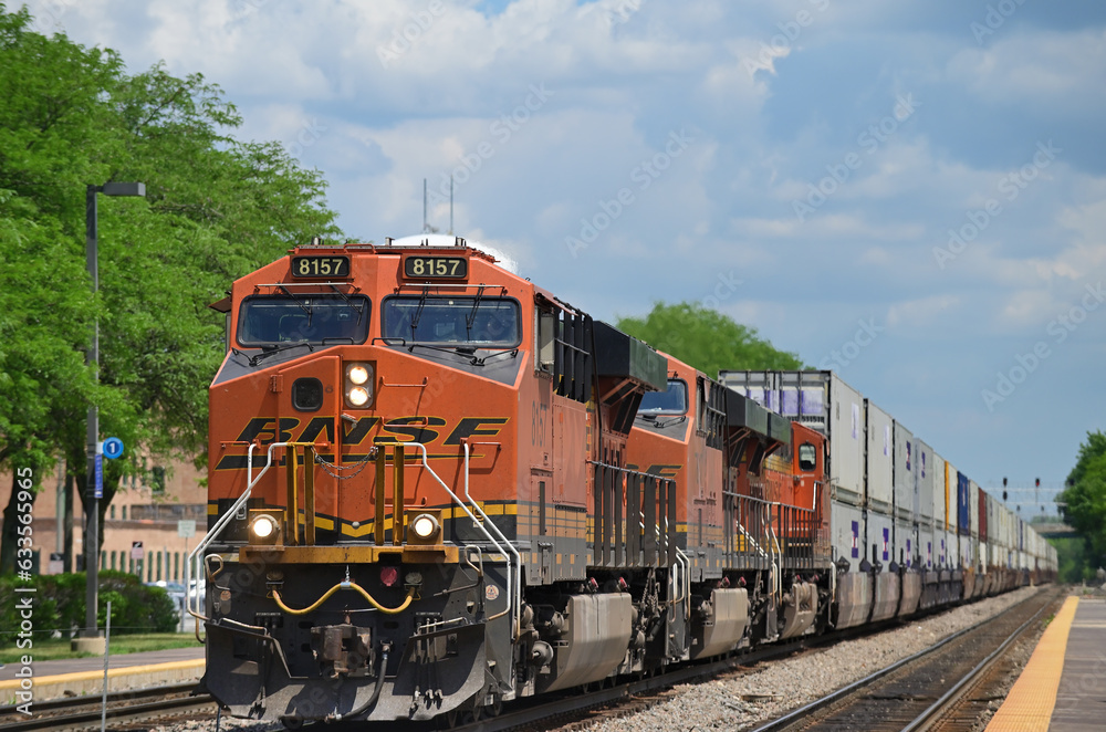 Burlington Northern Santa Fe locomotives lead an intermodal freight ...