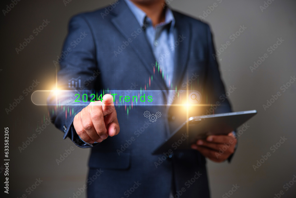 Trends for 2024 concept, Businessman searching for 2024 trends for ...