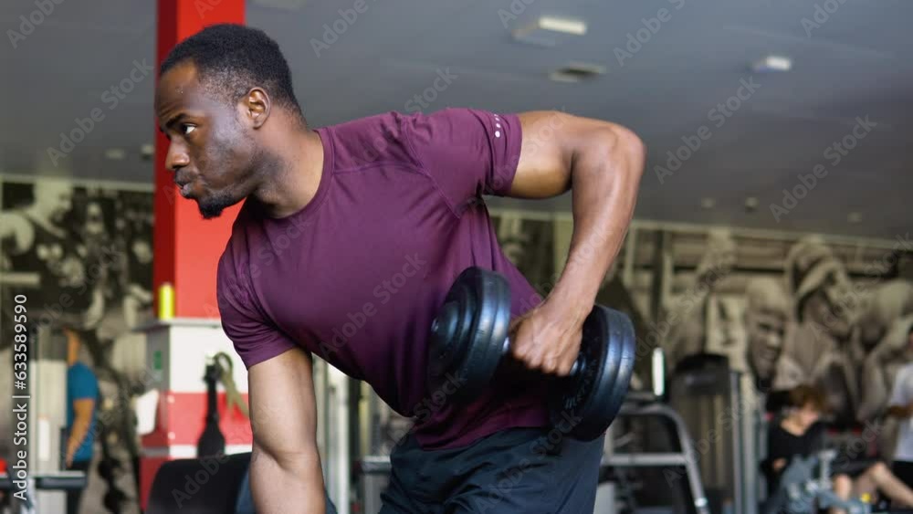 Video „Motivated african american shirtless bodybuilder training arms ...