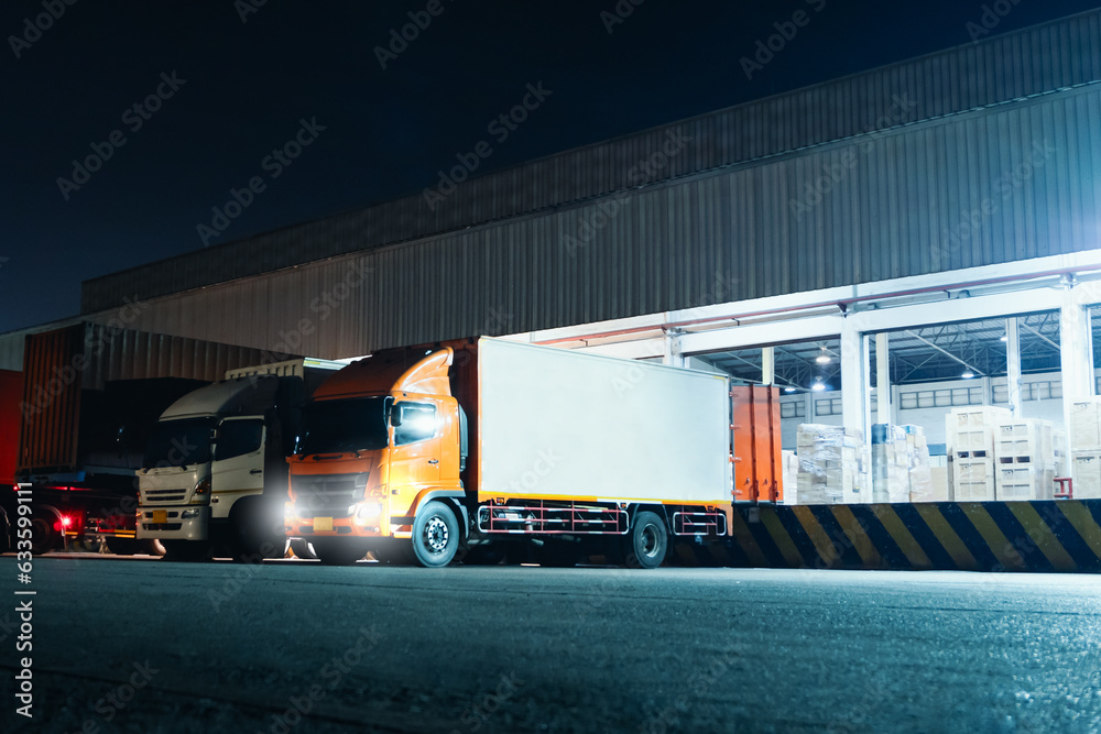 Trucks Loading Goods at Warehouse Port at Night. Trucks Loading Dock ...