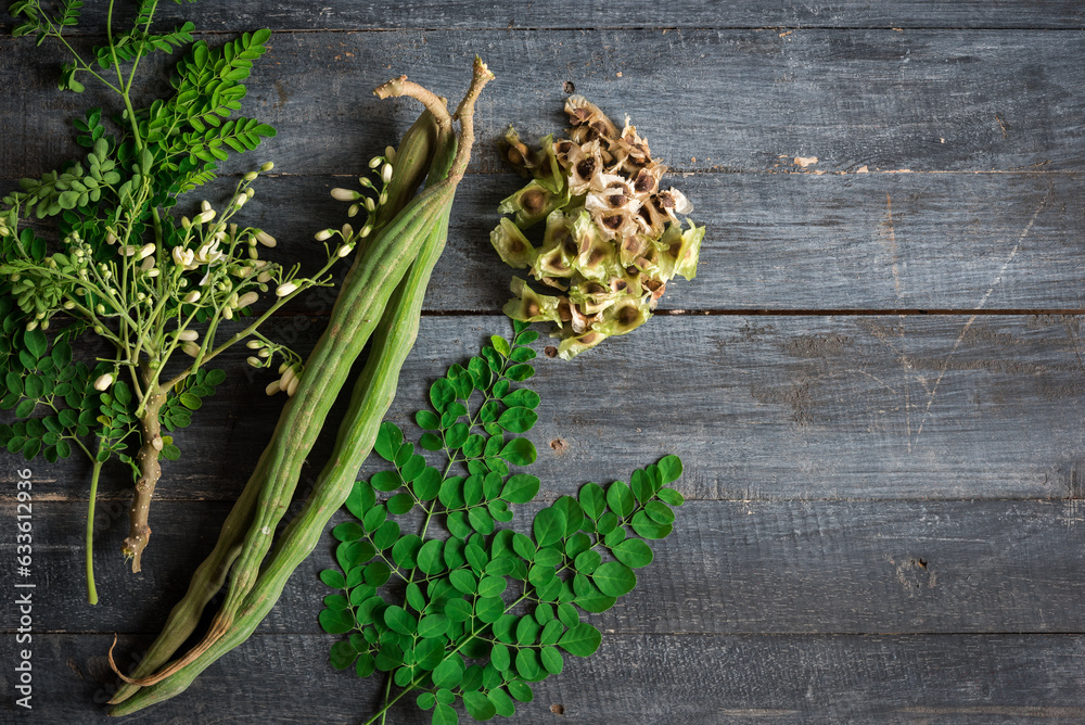 Moringa oleifera, Moringa leaves, Moringa flower, Moringa seed on wood ...