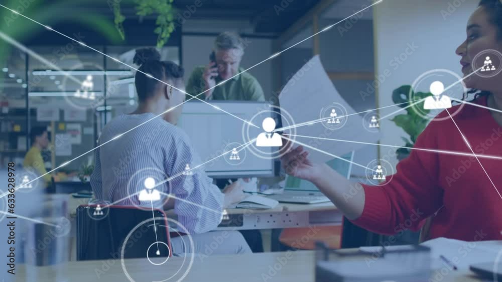 Animation of connected icons over diverse female coworkers sharing ...