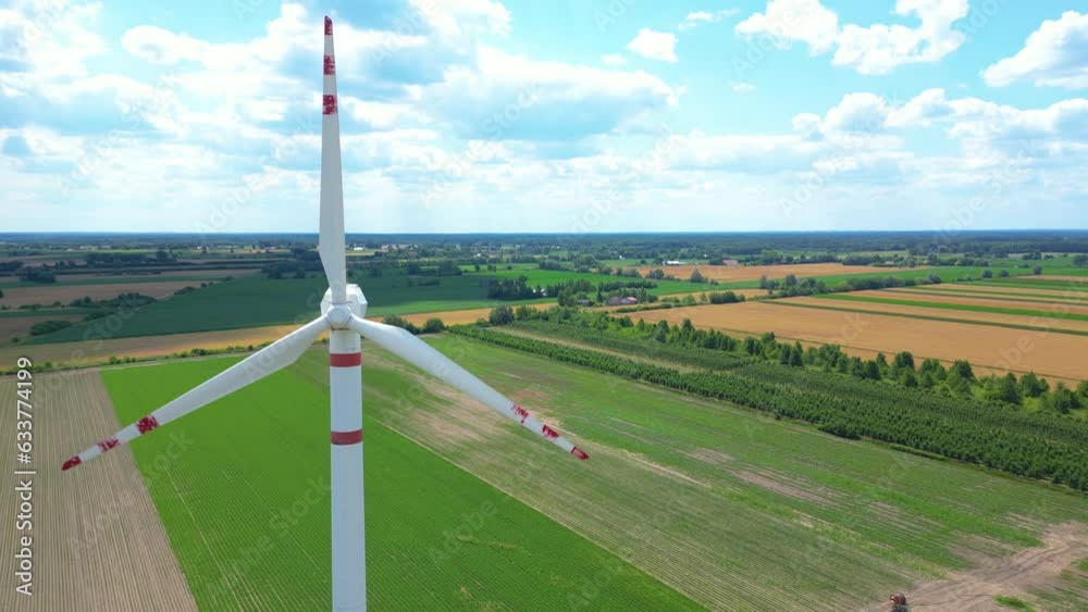 Panoramic view of wind farm or wind park, with high wind turbines for ...