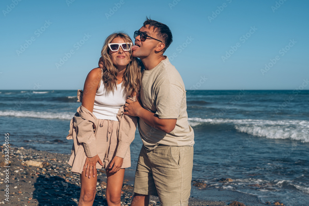 boyfriend and girlfriend husband and wife on vacation at sea have fun ...
