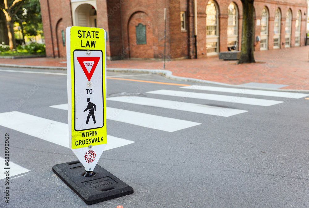 yellow pedestrian sign, a universal symbol of safety and shared space ...