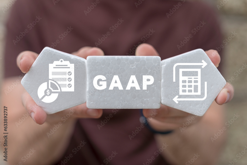 Foto de Man holding white plastic foam blocks with icons and sees ...