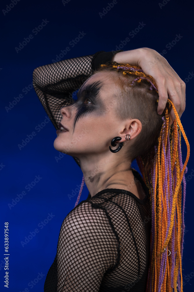 Cinematic portrait of informal woman with colored braids hairdo and ...
